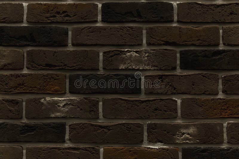 The Surface of a Dark Brown Brick Wall. Decorative Facing Tiles. Background Stock Photo - Image ...