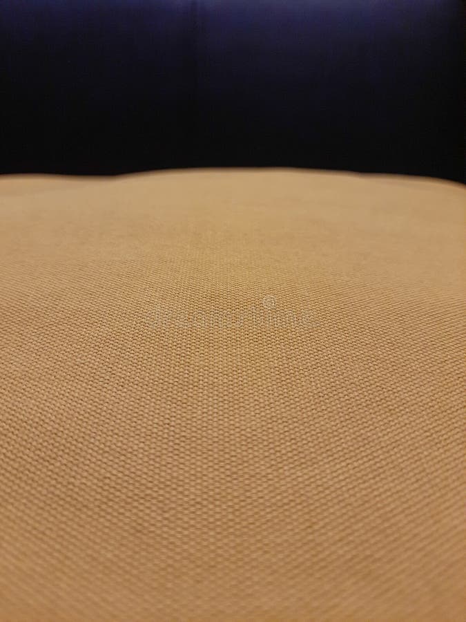 The Surface of the Fabric is Sandy Yellow on a Black Background Stock ...