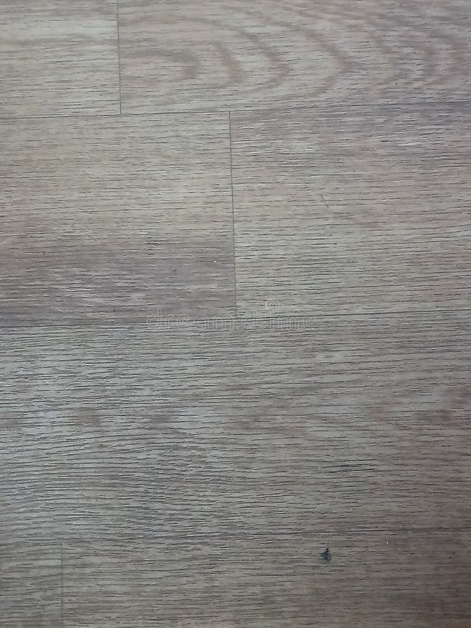 The Surface of the Floor Covered with Wood-like Laminate Stock Photo ...