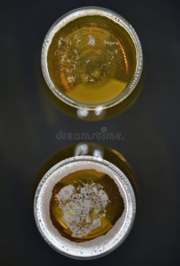 The Surface of a Glass of Beer. Beer Foam in a Glass Stock Photo ...