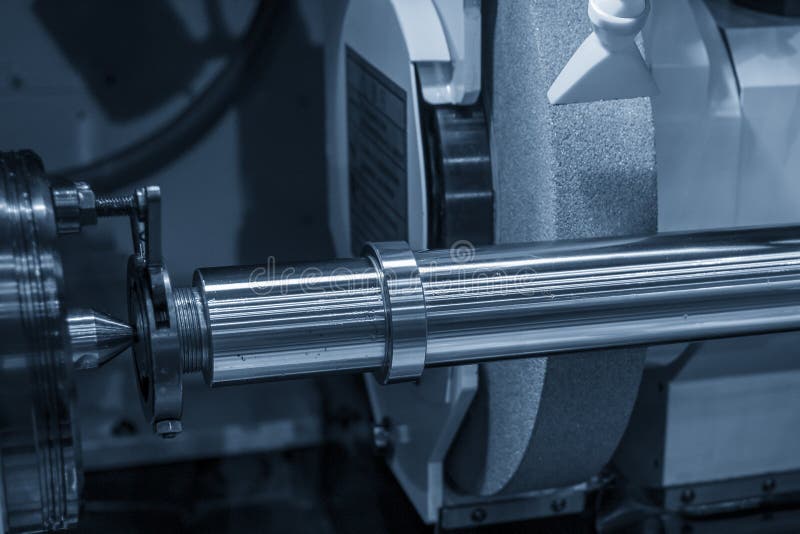 The Surface Grinding Process by Cylindrical Grinding Machine. Stock ...