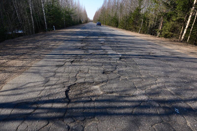 Surface of the Highway is Illuminated by the Slanting Rays of the Sun ...