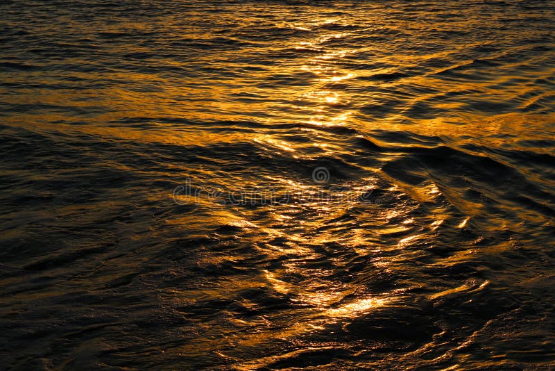 Close Up of Ocean Surface at Sunset Stock Photo - Image of colorful ...