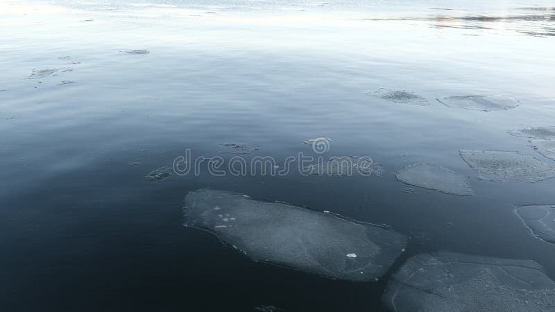 Surface is Partially Frozen with Shattered Pieces of Ice Stock Image ...