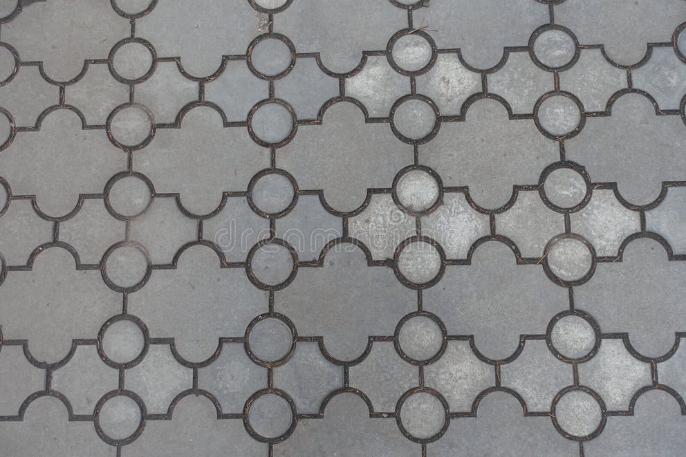 Surface of Pavement of Curved Grey Interlocking Concrete Tiles Stock ...