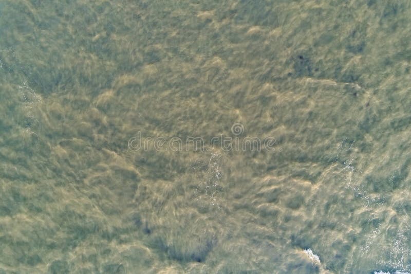 The Surface of the Sea in Shallow Water with Waves and Muddy Water ...