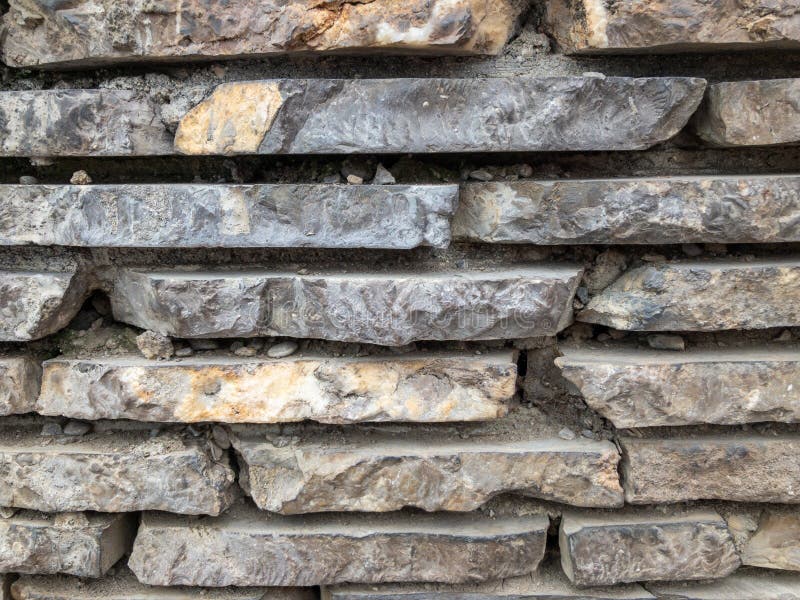 The Surface of a Stone Wall. Masonry Walls of Old Stone Blocks Stock ...