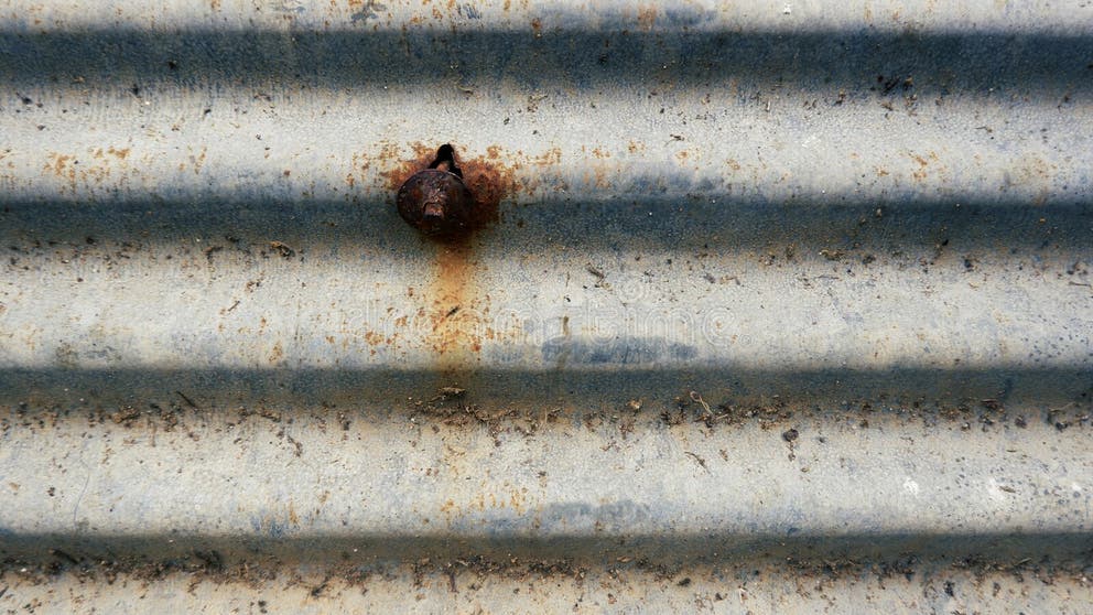 The Surface Texture Background of Corrugated Zinc Sheet with Rust at ...