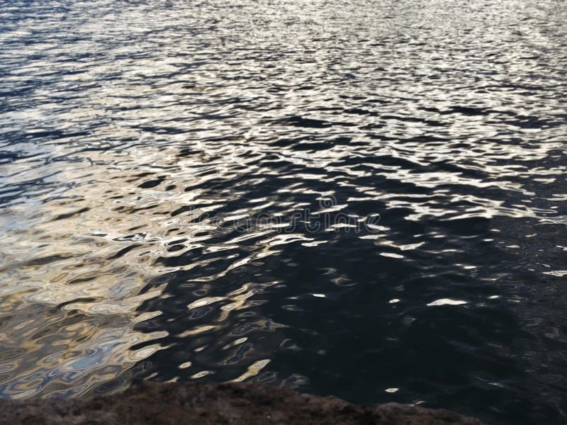 Surface and Texture of Blue Turquoise Sea Water with Sunlight ...