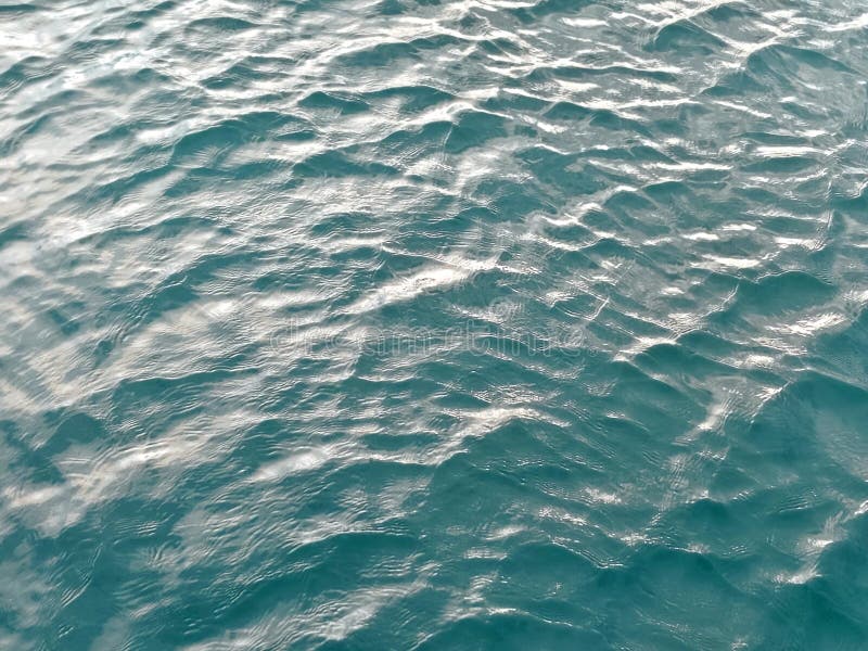 Surface and Texture of Blue Turquoise Sea Water with Sunlight ...