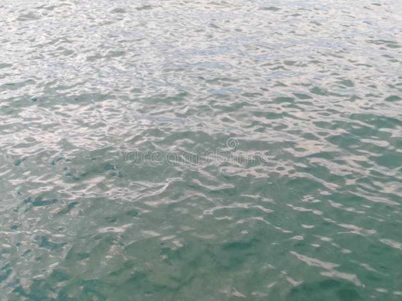 Surface and Texture of Blue Turquoise Sea Water with Sunlight ...