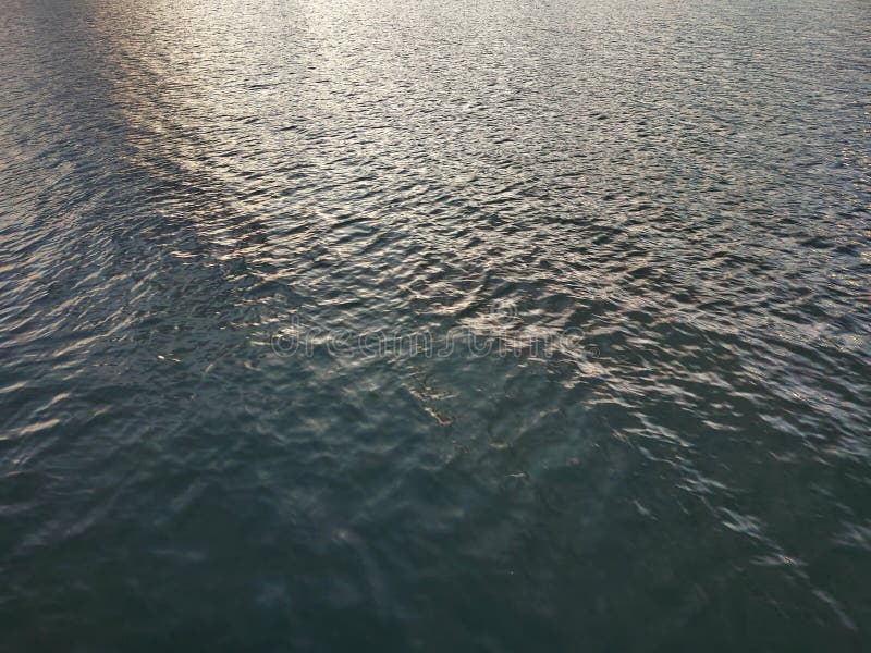 Surface and Texture of Blue Turquoise Sea Water with Sunlight ...