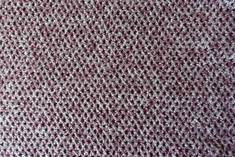 Surface of Pink, Grey and White Woolen Fabric with Diamonds Pattern ...