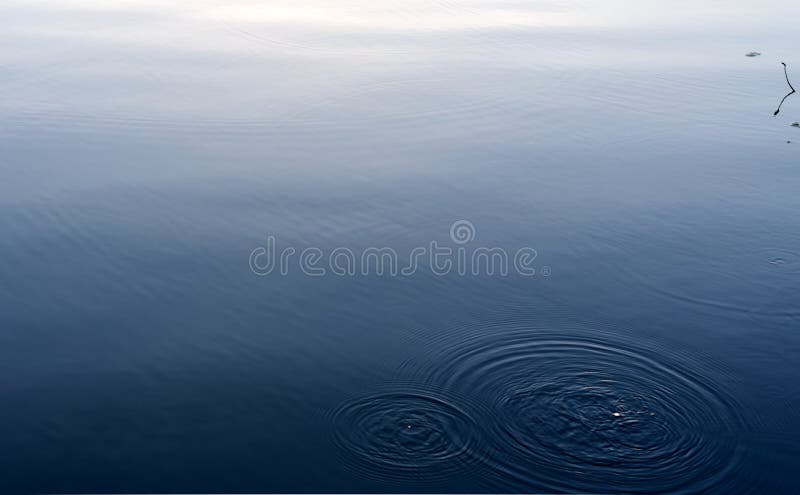 The Surface of the Water with a Gradient of Color from Dark To Light ...
