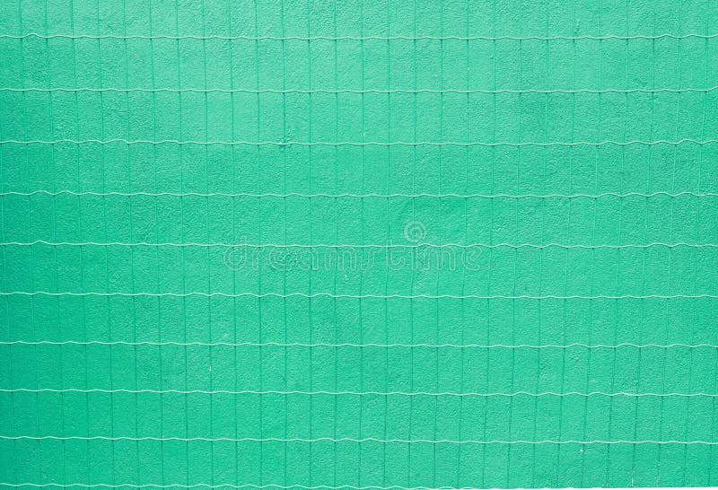 Green Colored Wall through a Green Grid Stock Photo - Image of design ...