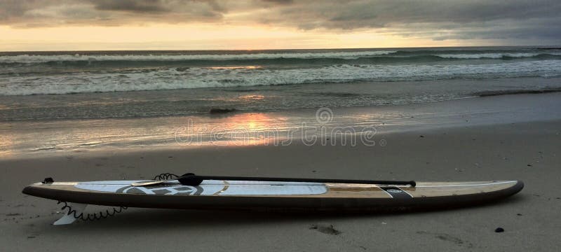 Surfboard on the Sand at Sunset Editorial Stock Image - Image of ...