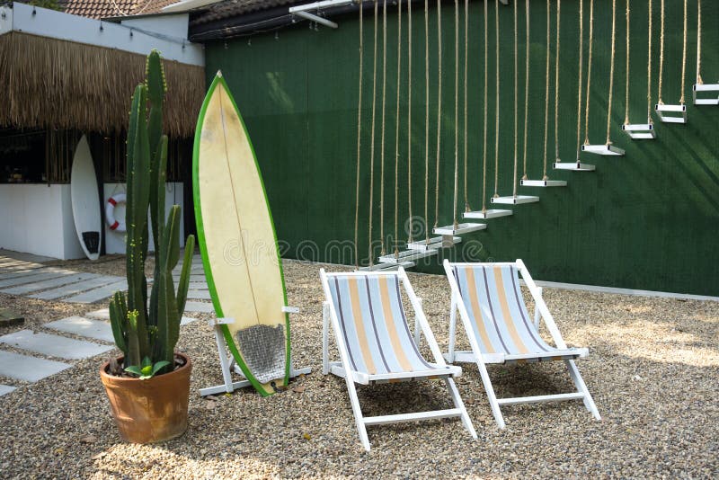 Surfboards Serve and Chairs As Decor in Beach Cafe Stock Photo - Image ...