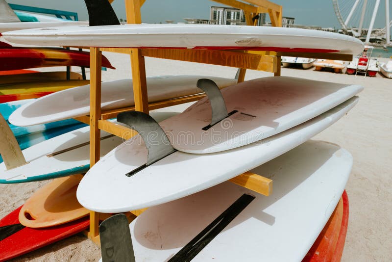 Surfboards Stacked on the Rack on a Beach Stock Photo - Image of ...
