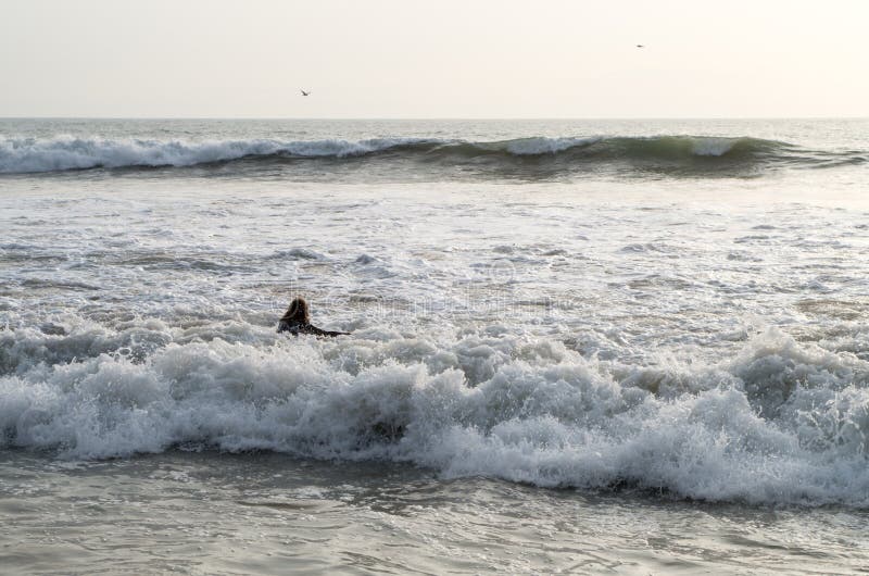 Surfer Attempts To Get Behind the Waves Stock Image - Image of rock ...