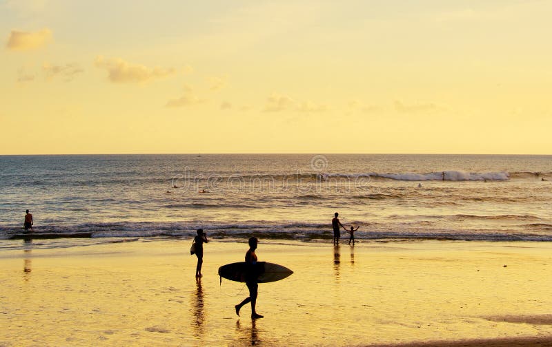 Surfer at Bali Island Beach Stock Photo - Image of sunset, activity ...