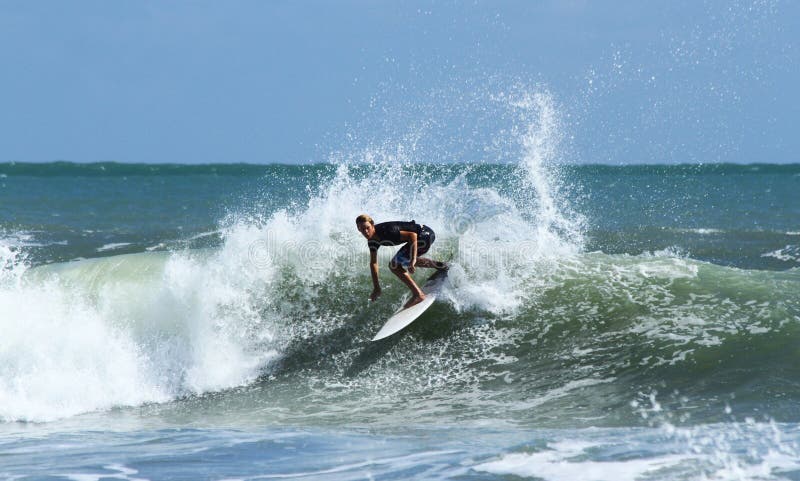 Surfer at Bali editorial image. Image of activity, white - 47497270