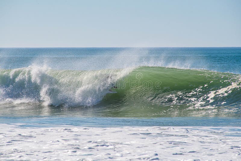 Surfer in a Barrel Falling Under the Force of the Waves Stock Photo ...