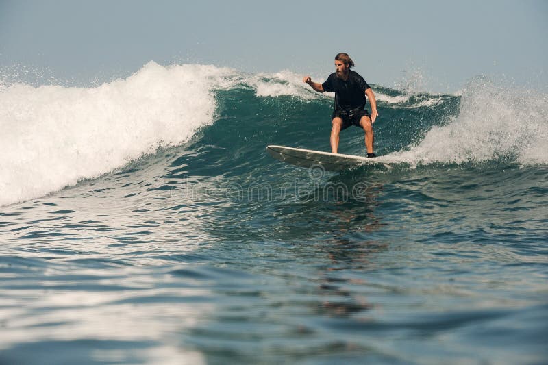 Surfer with Beard on the Board in Ocean Stock Photo - Image of board ...