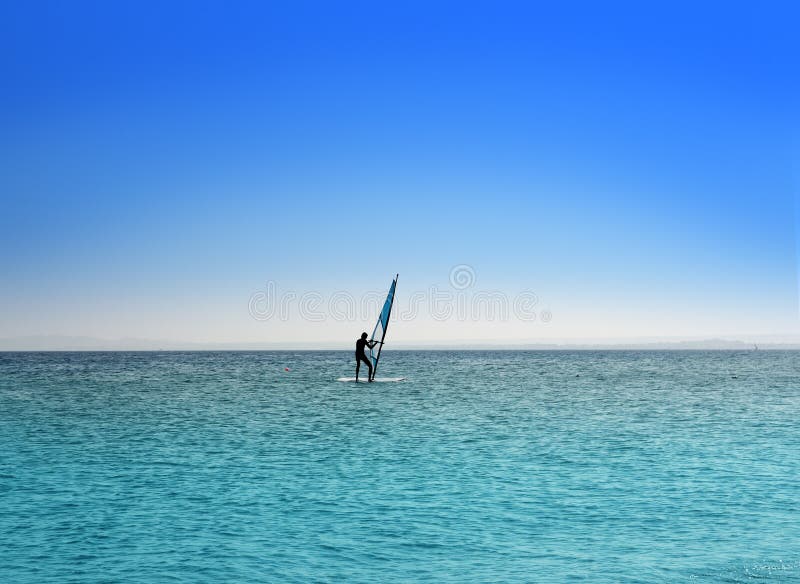 Surfer on Blue Sea Under Sky Stock Photo - Image of water, competitive ...