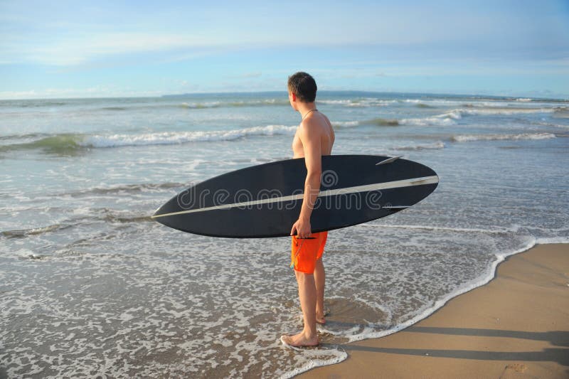 Surfer with board stock image. Image of green, hawaii - 45536045