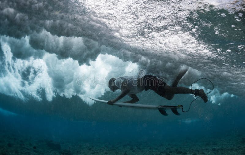Surfer dives stock photo. Image of extreme, power, swell - 168827130