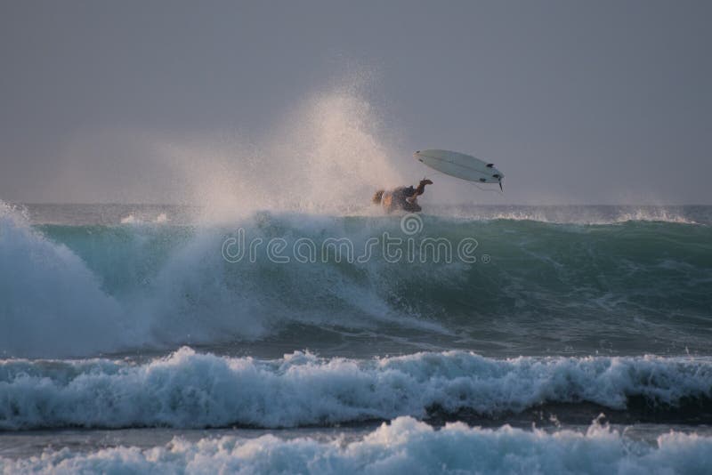 Surfer drop stock photo. Image of surfer, drop, indosesia - 57401334