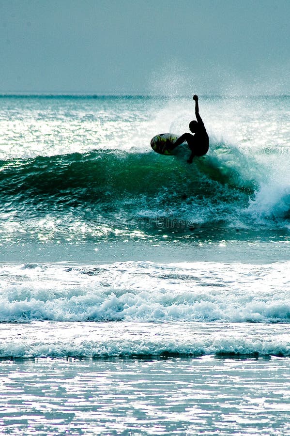 Surfer at dusk stock photo. Image of ocean, coast, spring - 7685670
