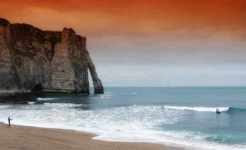 Surfer in Etretat beach stock image. Image of coast - 150198829