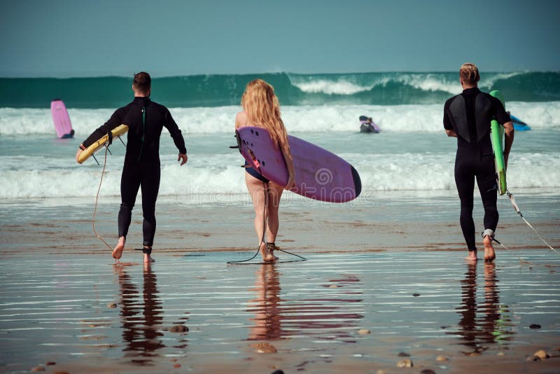 Surfer Friends on a Beach with a Surfing Boards Stock Photo - Image of ...