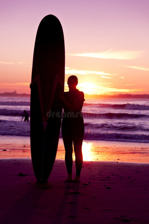 Surfer Girl on the Beach at Sunset Stock Photo - Image of surfboard ...