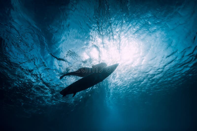 Surfer Girl with Surfboard Dive Underwater with Under Ocean Wave Stock ...