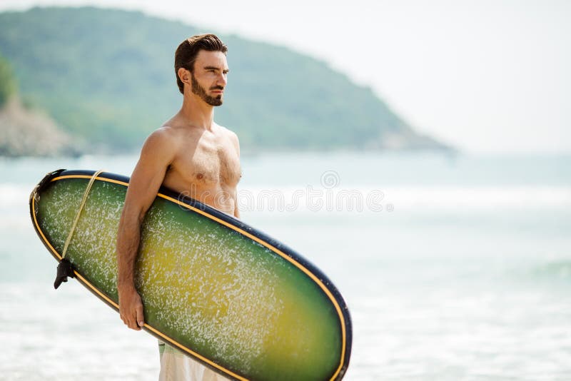 Surfer Man with Surfboard on Sea Coast. Stock Image - Image of ...