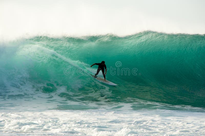 Surfer in the Ocean stock photo. Image of coast, surfer - 139593838