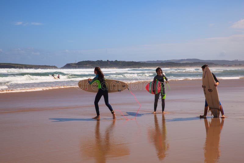 Surfer People Carrying Their Surfboard on the Beach Editorial Photo ...