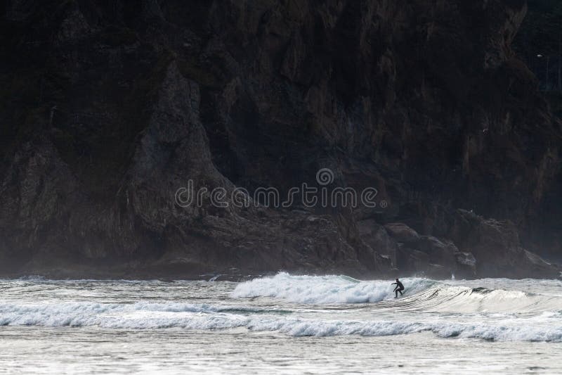 A Surfer is Riding a Wave in the Ocean Stock Photo - Image of nature ...
