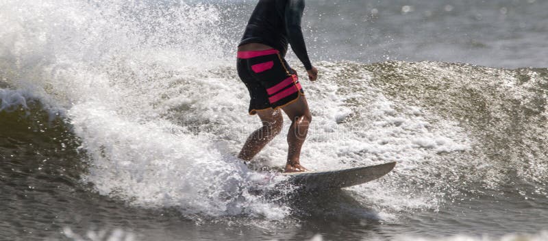 Surfer Riding a Wave on a Rough Water Day Stock Image - Image of ...