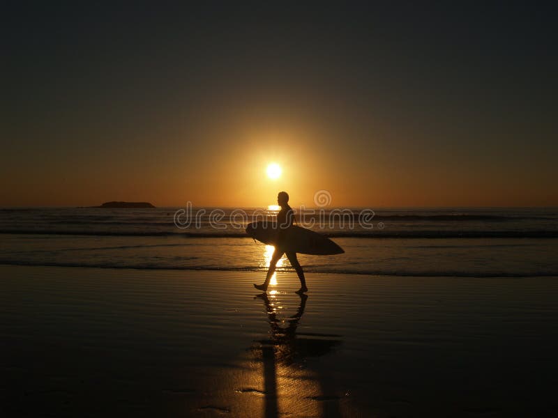 Surfer in sunset stock photo. Image of skyline, relax - 1396644