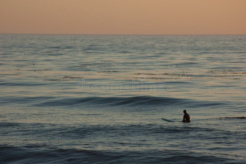 Surfer at sunset stock photo. Image of perfect, figure - 17049636