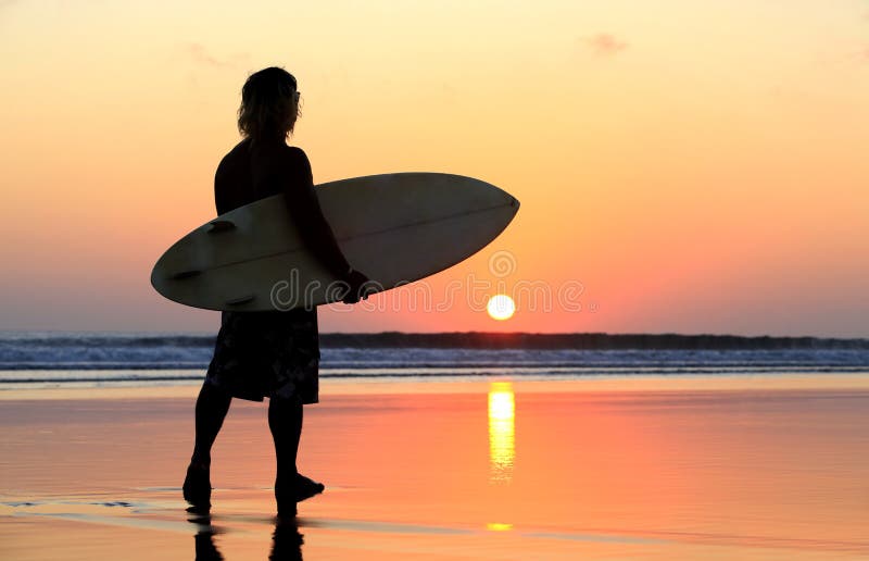 Surfer on sunset stock image. Image of activity, lifestyle - 26145379