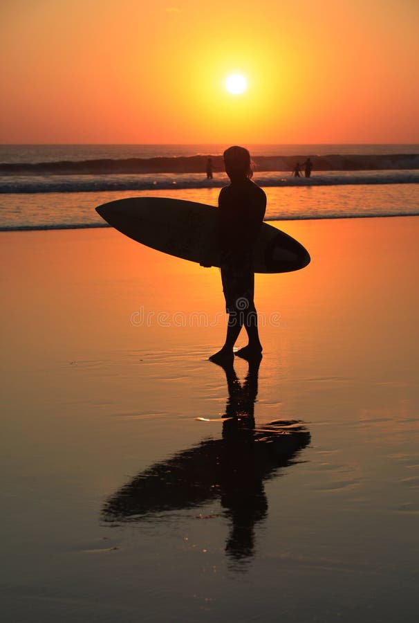 Surfer on sunset stock photo. Image of water, recreation - 26670058