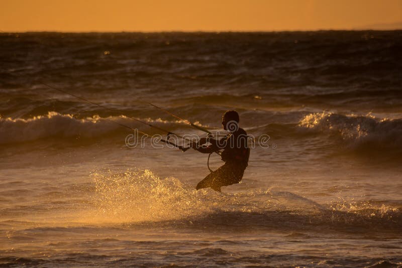 Surfer at Sunset on a Calm Ocean Editorial Photography - Image of calm ...