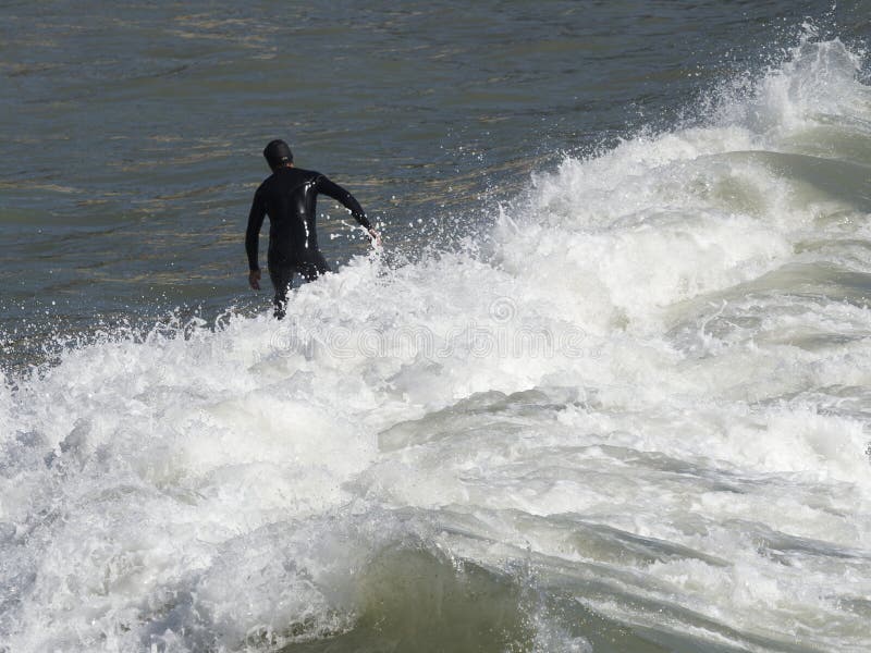 A Surfer Surf a Wave in Italy Editorial Photography - Image of crest ...
