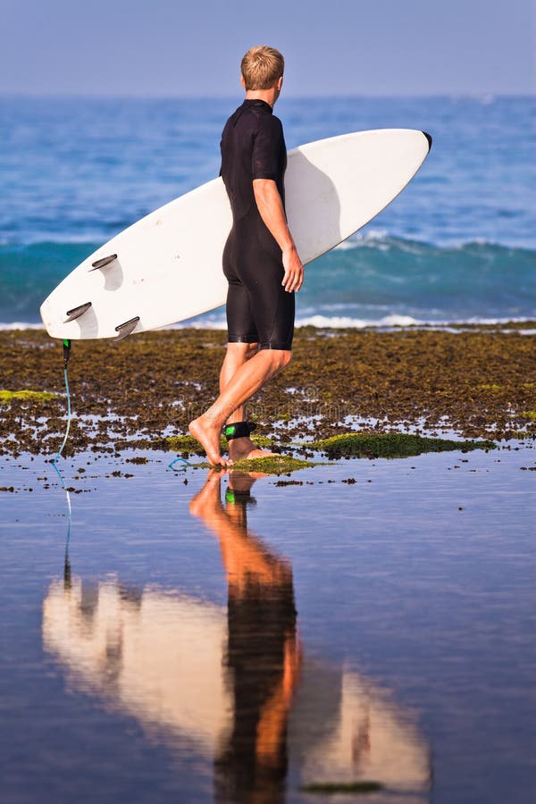 Surfer with Surfboard on the Beach Stock Photo - Image of extreme, male ...