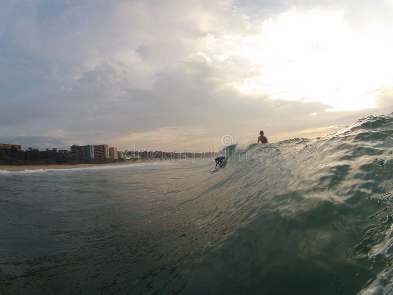 Surfer in the Tube Riding a Big Wave Stock Image - Image of athlete ...
