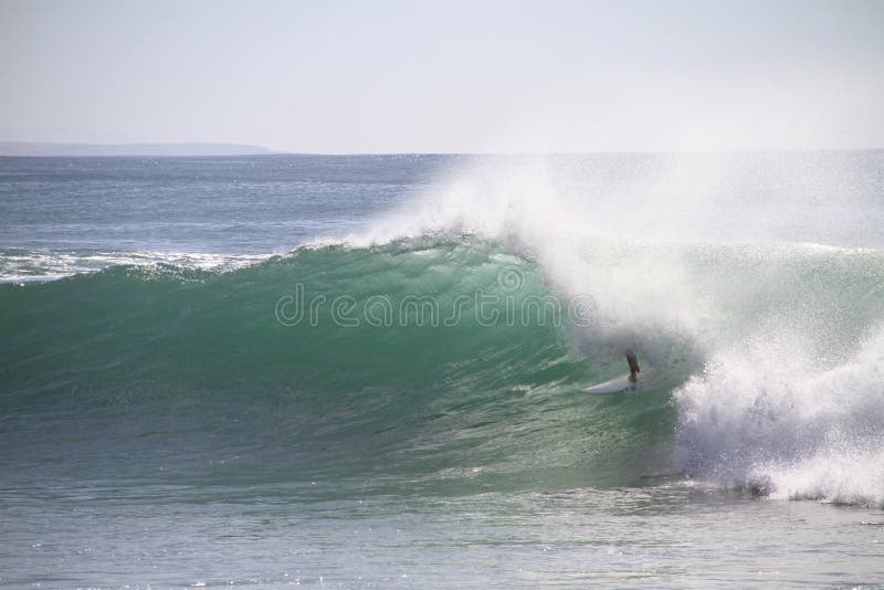 Surfer in the Tube Riding a Big Wave Stock Image - Image of athlete ...